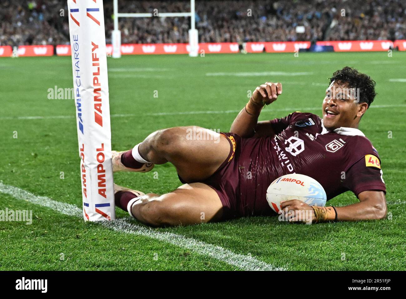 Adelaide, Australia. 31st May, 2023. Selwyn Cobbo of the Maroons scores ...