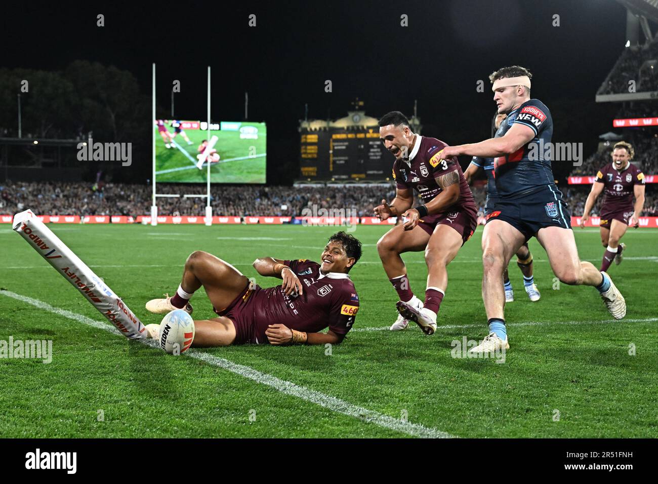 Adelaide, Australia. 31st May, 2023. Selwyn Cobbo of the Maroons scores ...