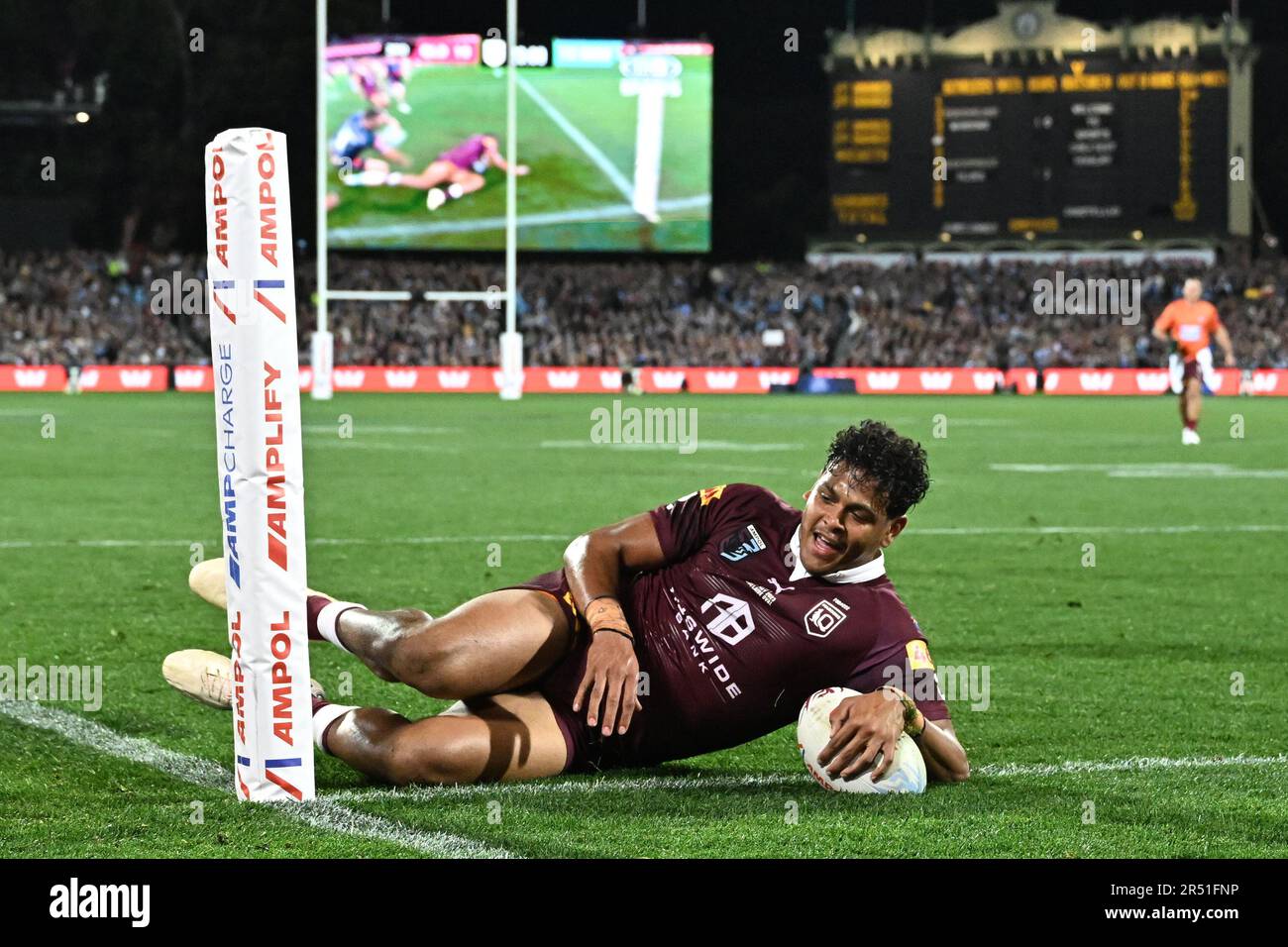 Adelaide, Australia. 31st May, 2023. Selwyn Cobbo of the Maroons scores ...