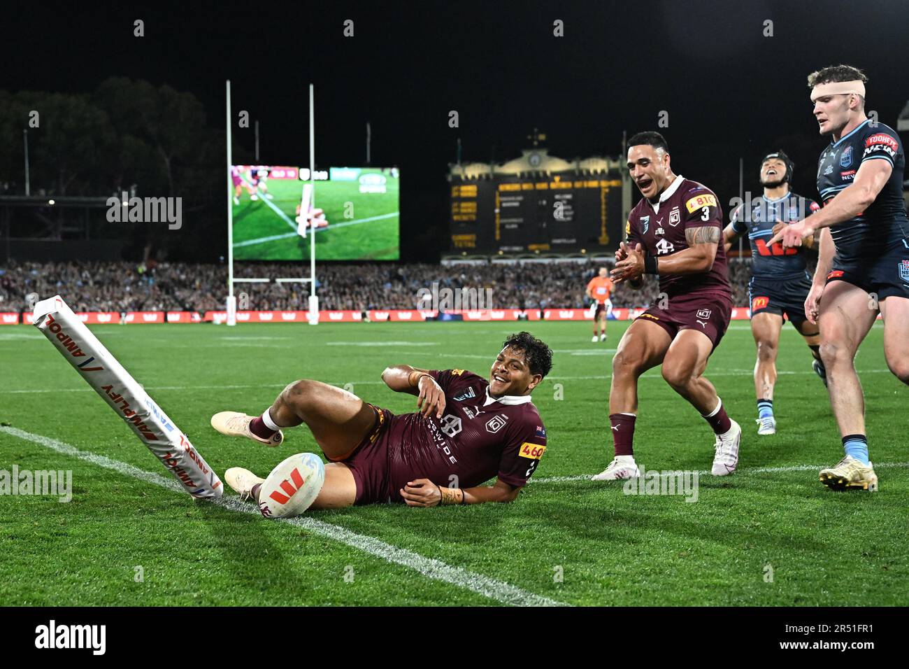 Adelaide, Australia. 31st May, 2023. Selwyn Cobbo of the Maroons scores ...