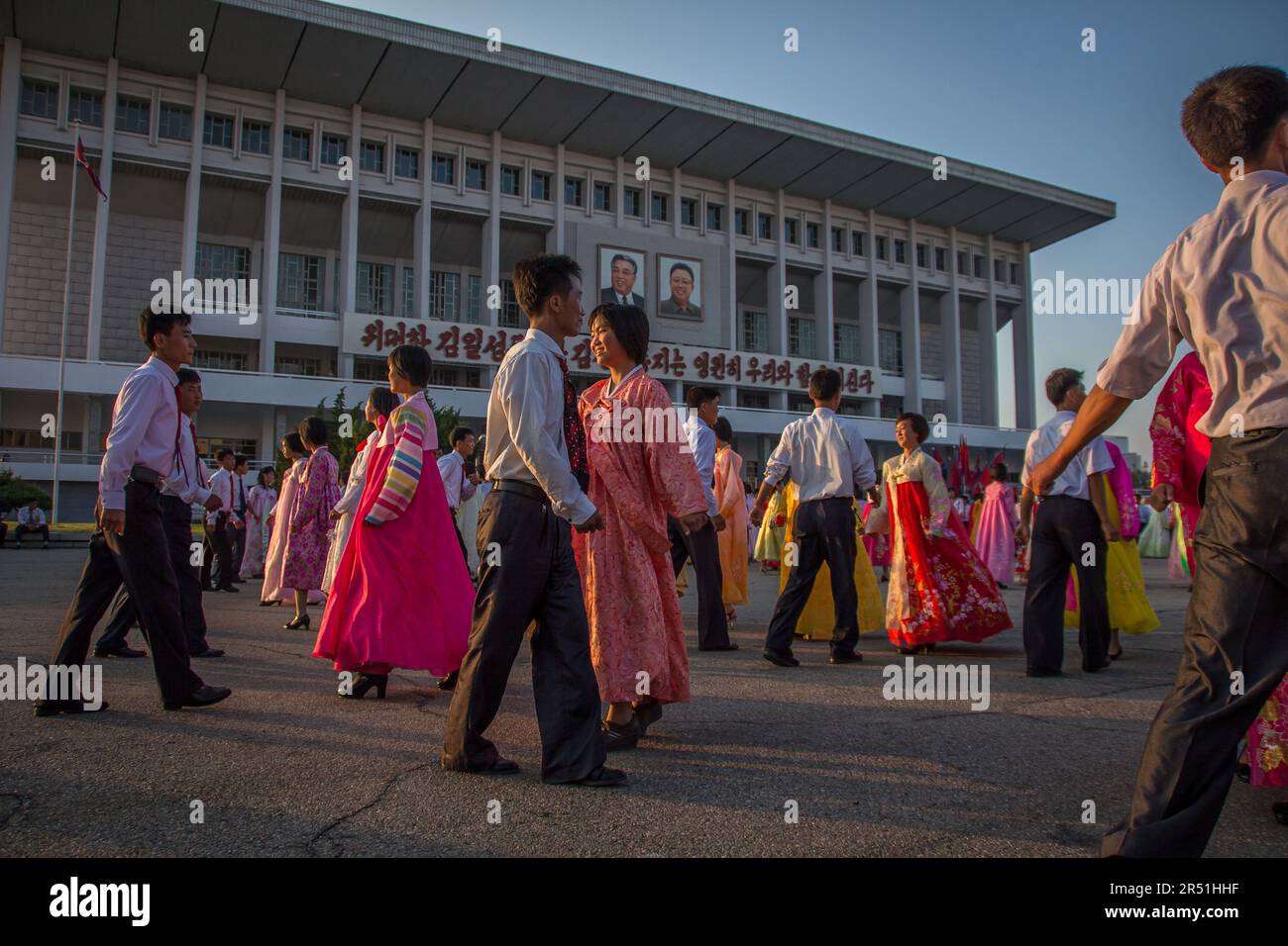 Mass dance in the streets on Pyongyang, North Korea Stock Photo - Alamy