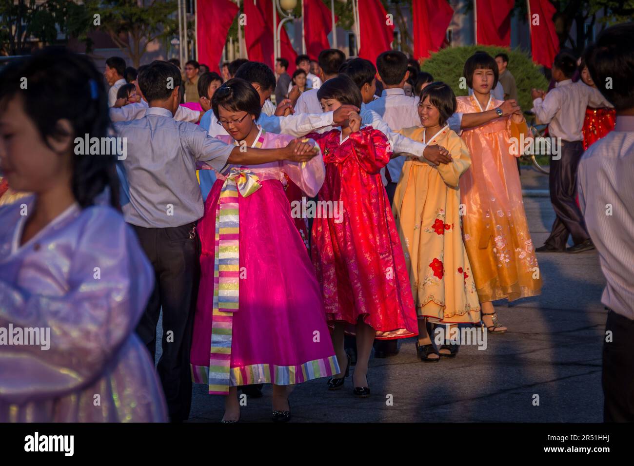 Mass dance in the streets on Pyongyang, North Korea Stock Photo - Alamy