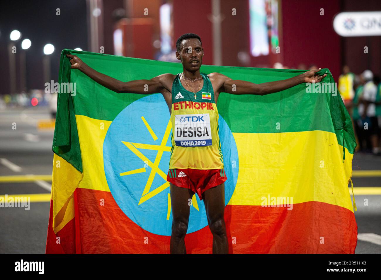 Ethiopia's Lelisa Desisa celebrates winning the mens marathon during ...