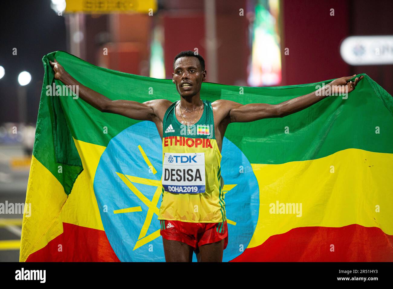 Ethiopia's Lelisa Desisa celebrates winning the mens marathon during ...