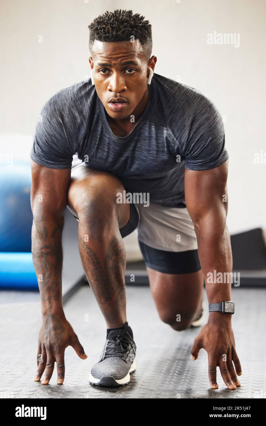 Fitness, exercise and black man in a gym, training and workout goal ...