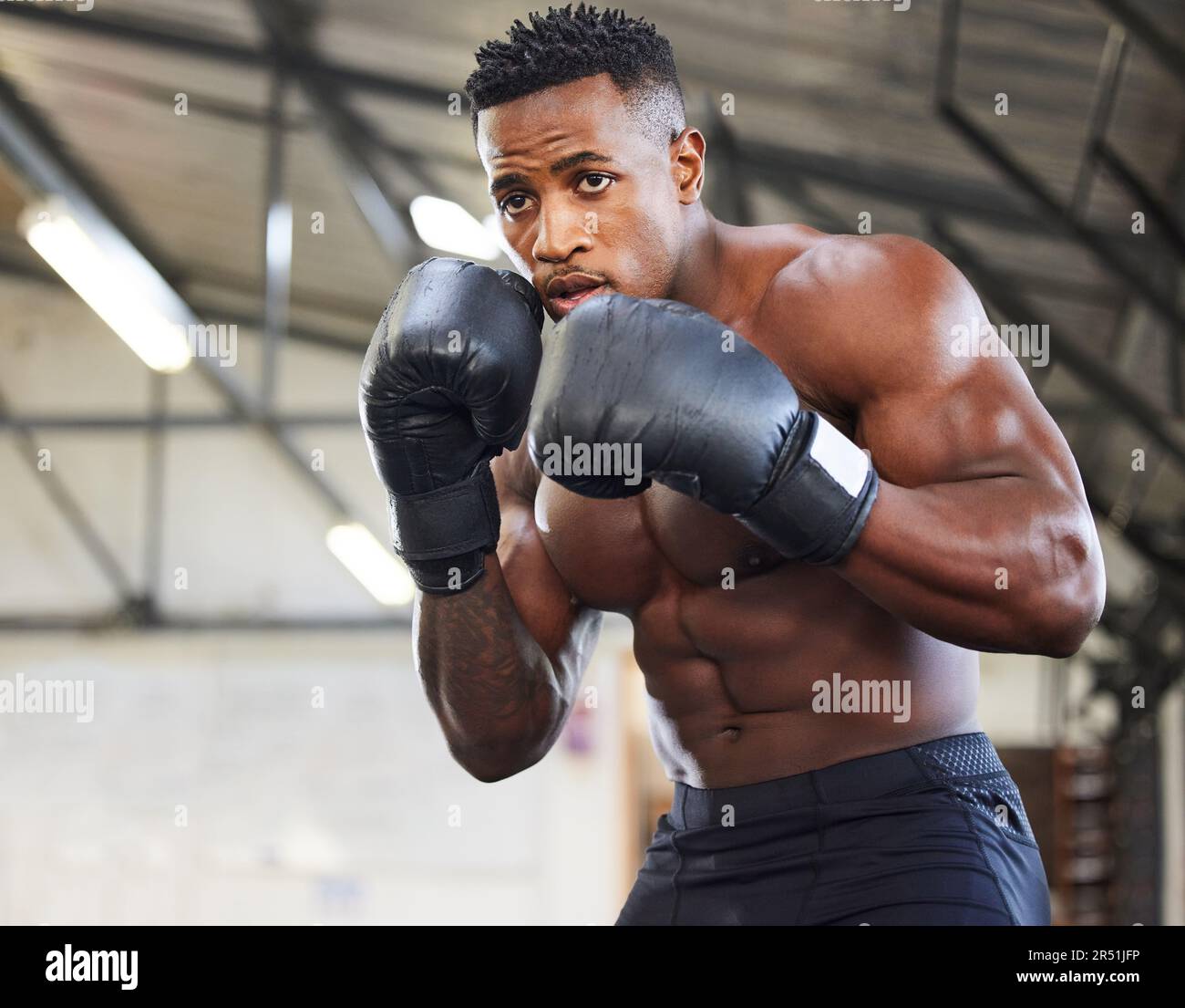 Guy boxing gloves hi-res stock photography and images - Alamy