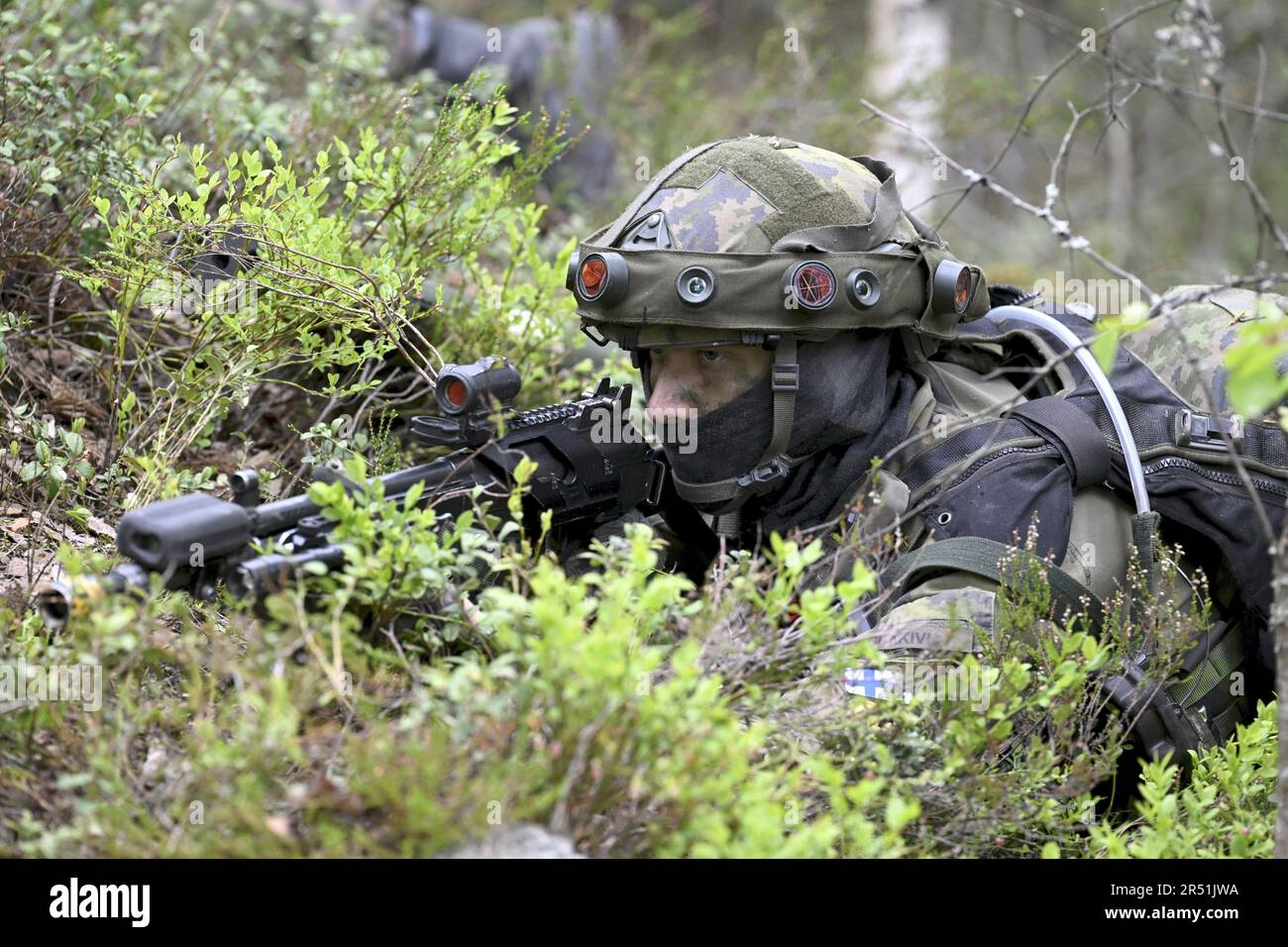 A Finnish soldier attends a field training exercise Sapeli 23, led by ...
