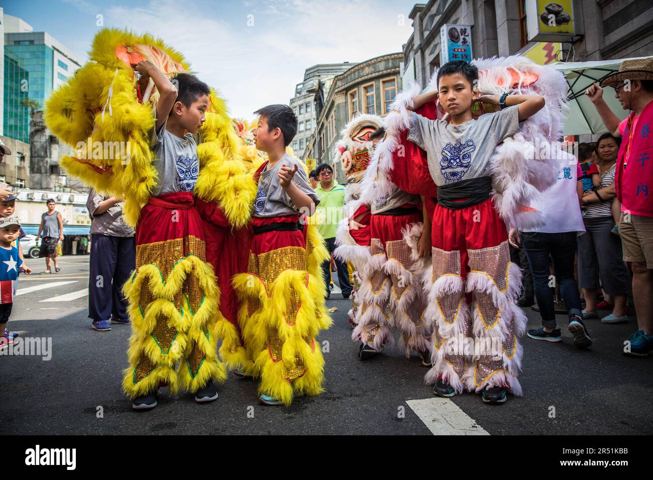kids performing drangon dance in the streets of Taipei, Taiwan Stock ...
