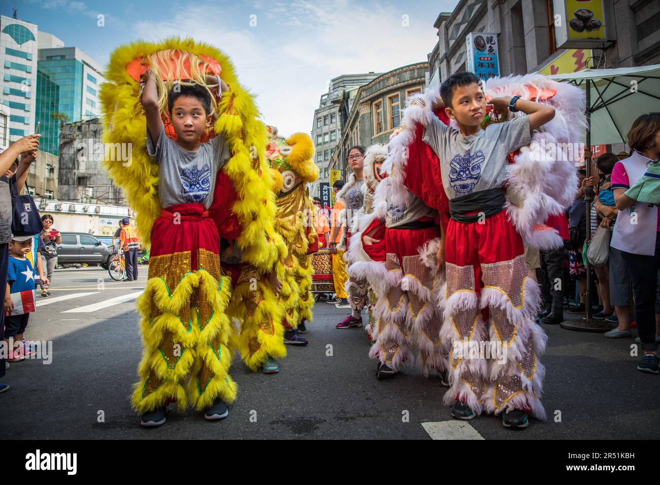 kids performing drangon dance in the streets of Taipei, Taiwan Stock ...