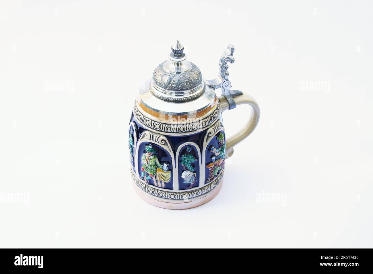 The photograph beautifully decorated traditional German mug for beer ...