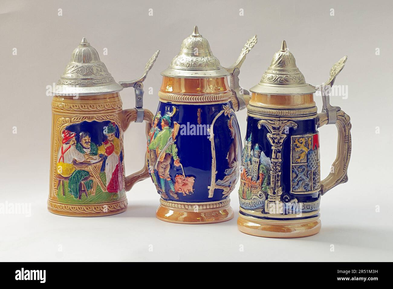 The photograph beautifully decorated traditional German mugs for beer ...