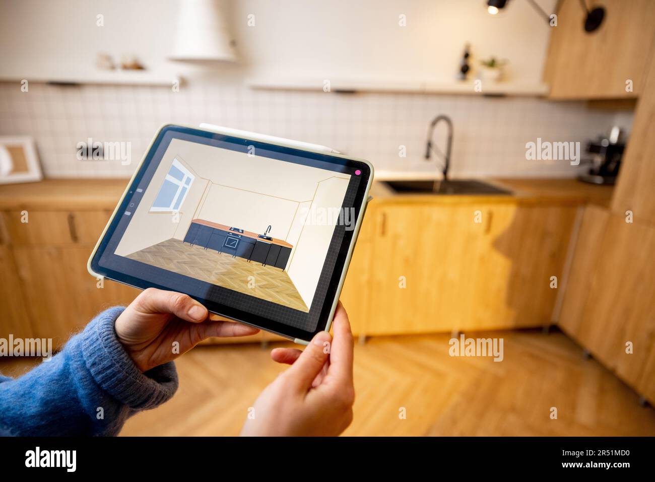 Designing kitchen space with a digital tablet Stock Photo - Alamy