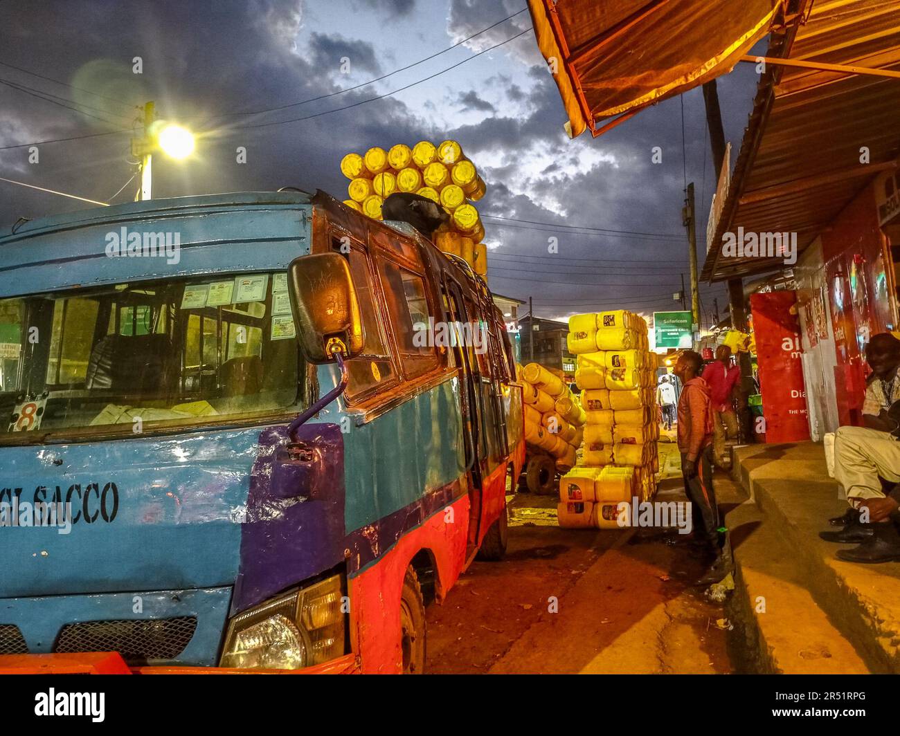 Nairobi, Kenya. 21st May, 2023. Waste collectors in Kibera Slum arrange ...