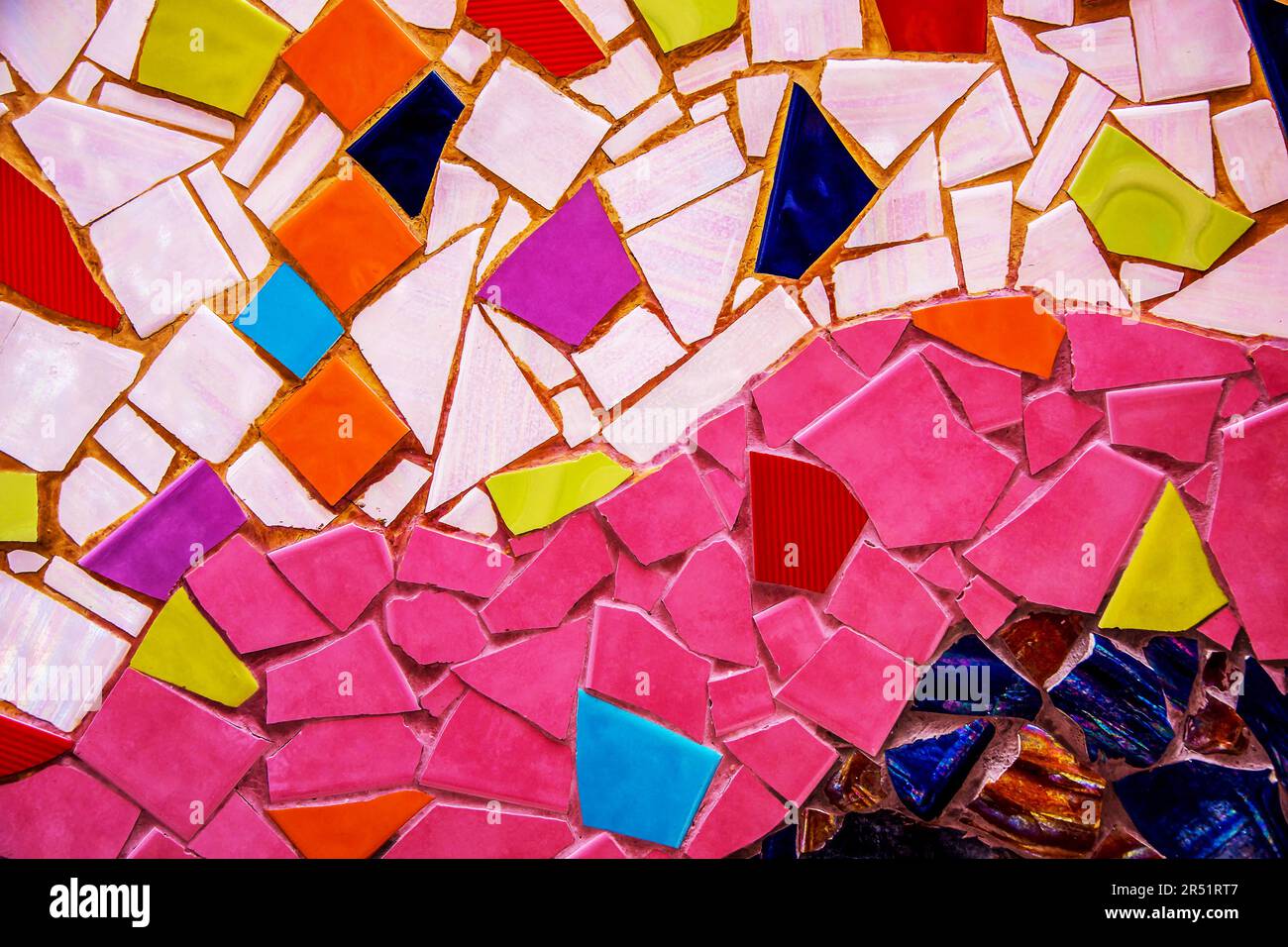 Colorful mosaic from broken tile and stone decorating on the wall for ...