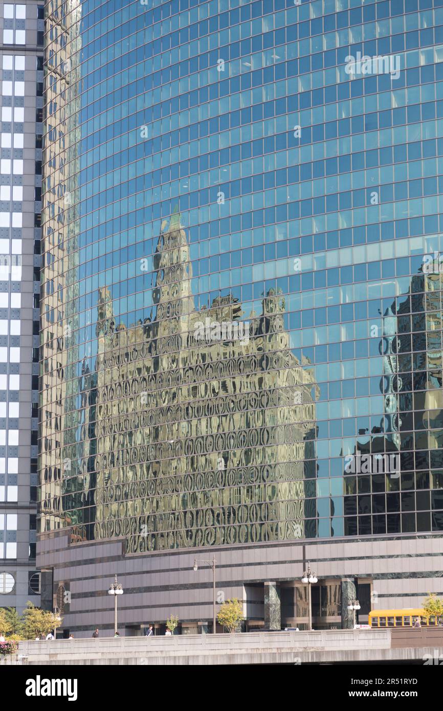 USA, Illinois, Chicago, office buildings reflected in glass facade of ...