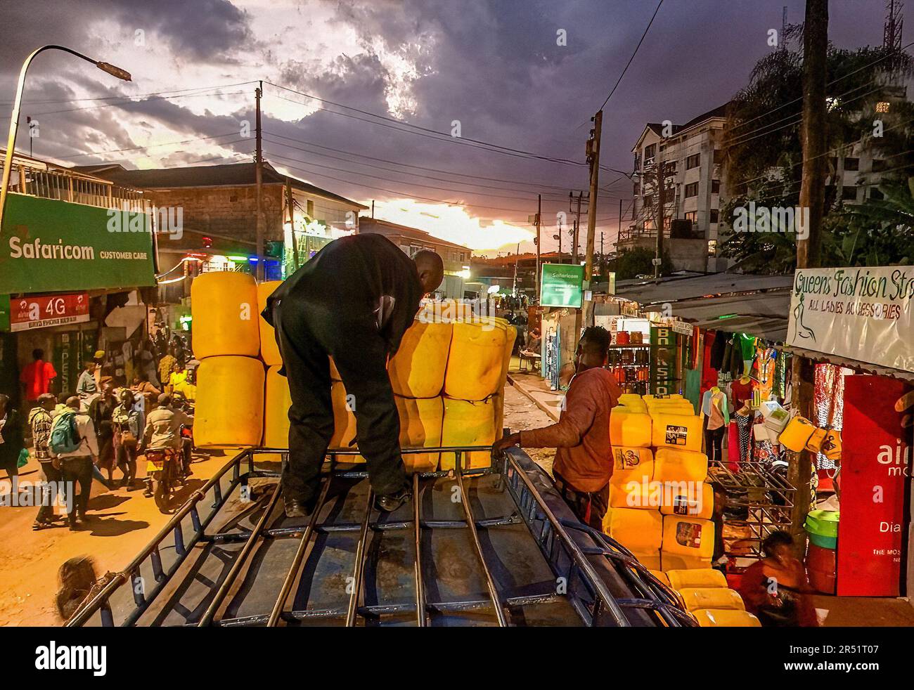 Nairobi, Kenya. 21st May, 2023. Waste collectors in Kibera Slum arrange ...