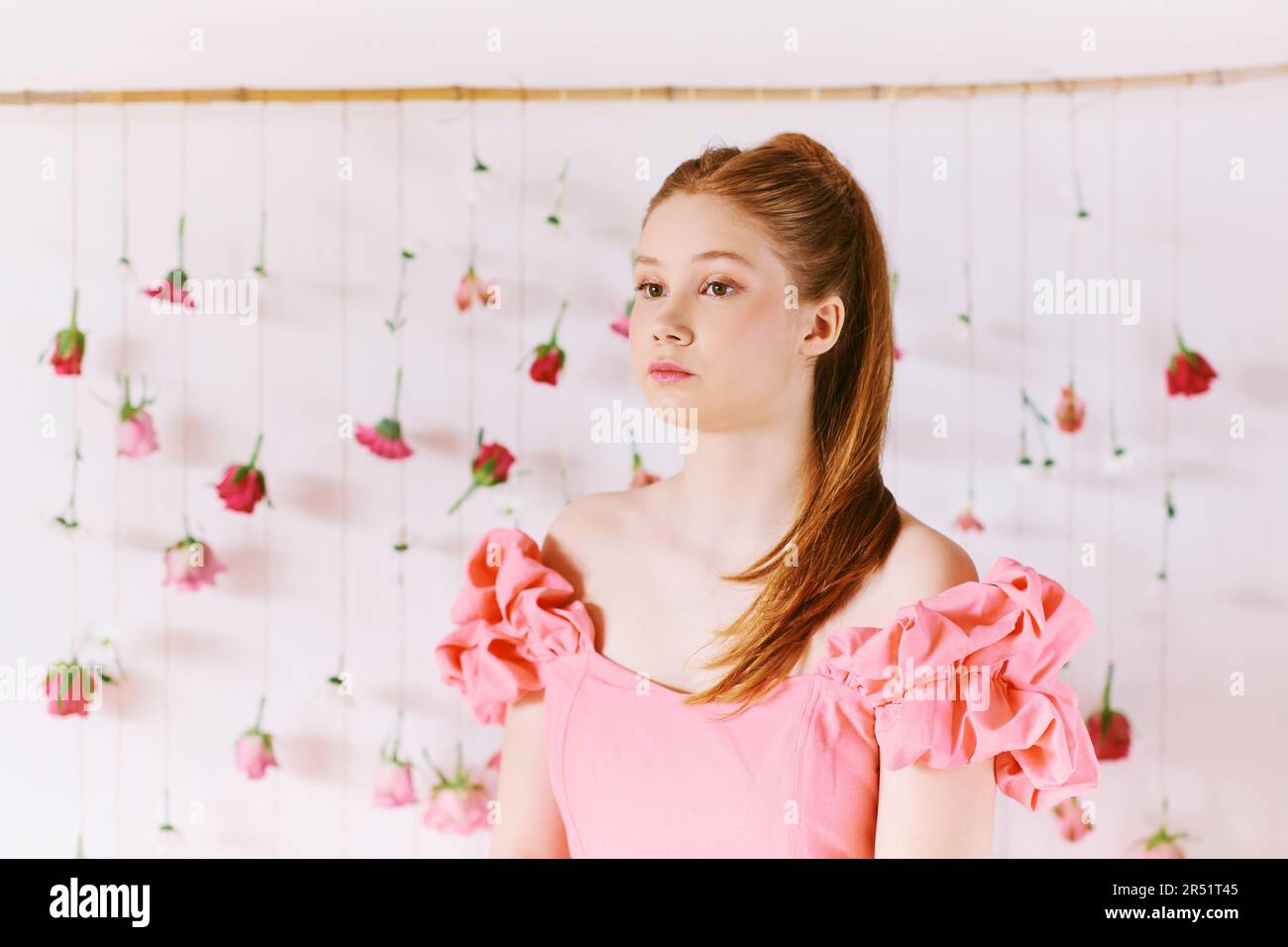 Studio portrait of pretty young teenage 15 - 16 year old red-haired ...