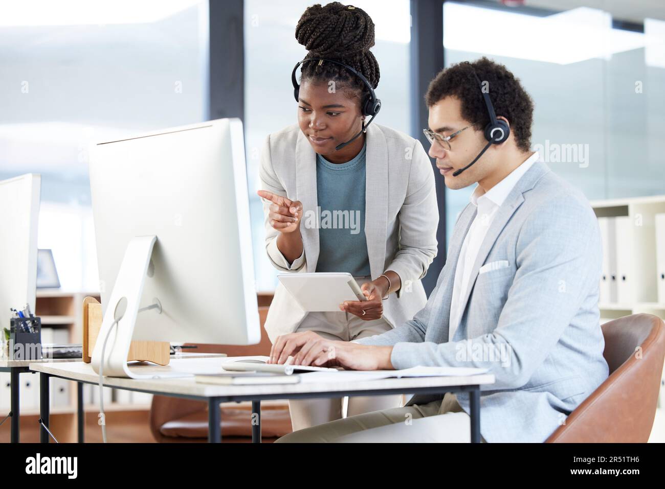 Call center, coaching and black woman with employee on computer for ...