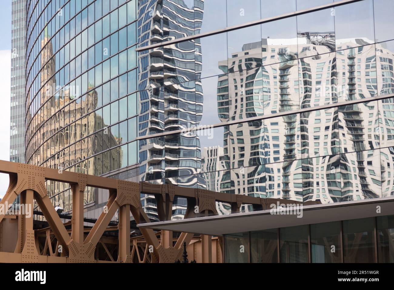 USA, Illinois, Chicago, Lake Street bridge and reflection of buildings ...