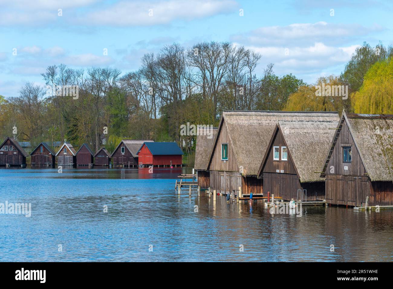 Traditional thatched fishermen´s huts on the Mueritz River, country ...