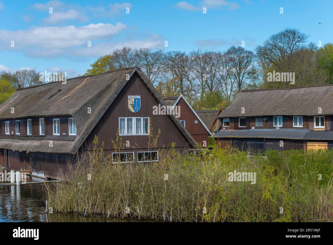 Traditional thatched fishermen´s huts on the Mueritz River, country ...