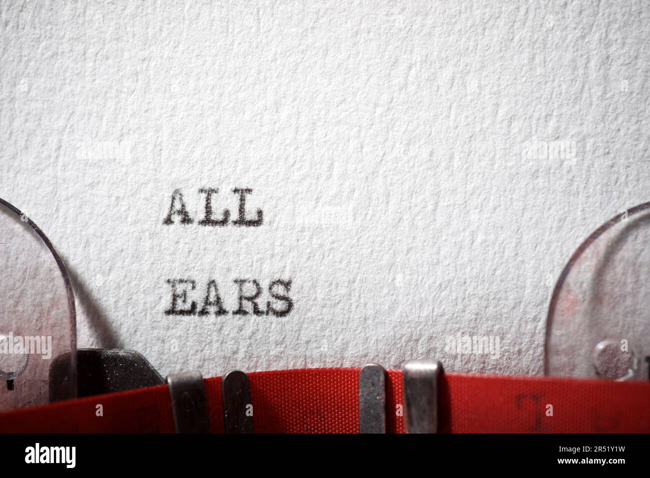All ears text written with a typewriter Stock Photo - Alamy