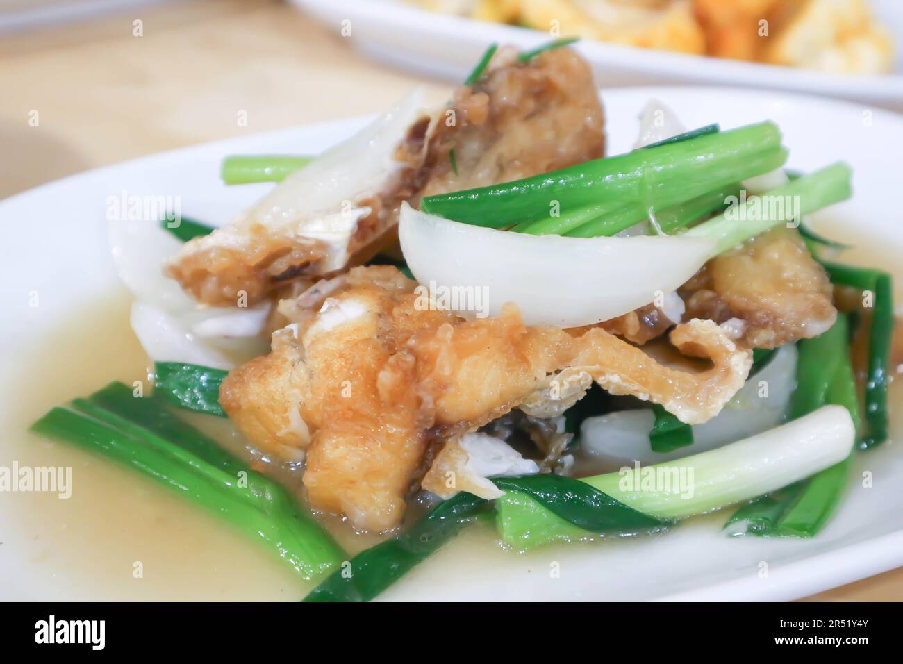 stir fried fish with vegetableor fried fish in gravy sauce Stock Photo ...