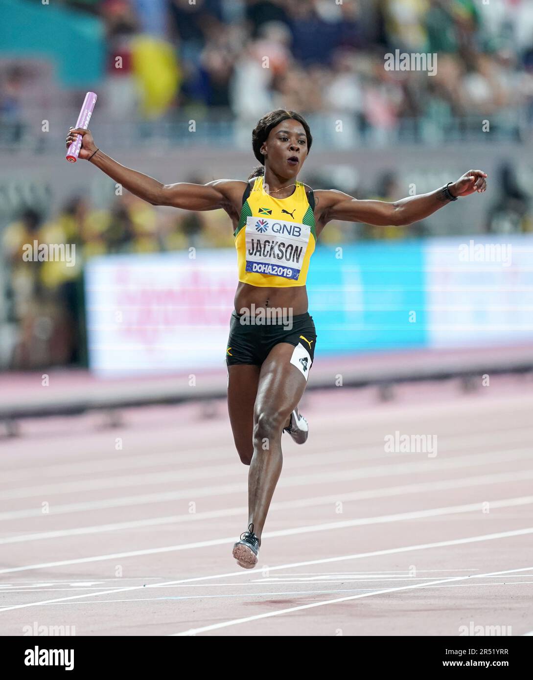 Shericka JACKSON running the 4x100m relay at the 2019 World Athletics ...