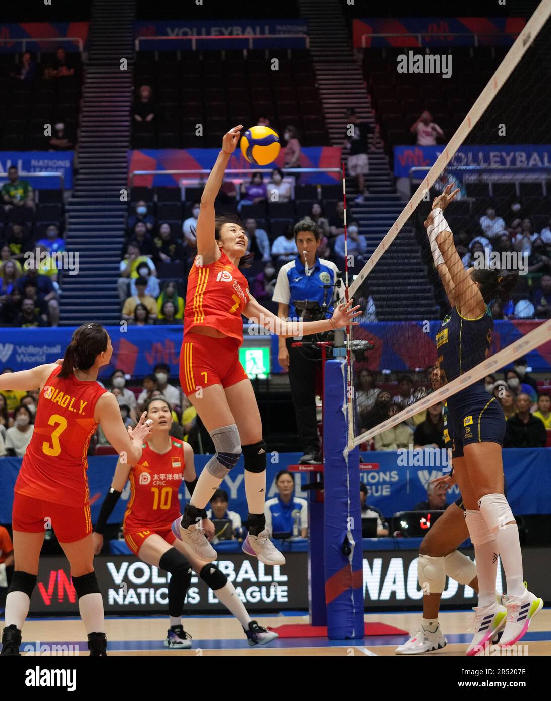 Nagoya, Japan. 31st May, 2023. Wang Yuanyuan (top) of China spikes the ball during the 2023 ...