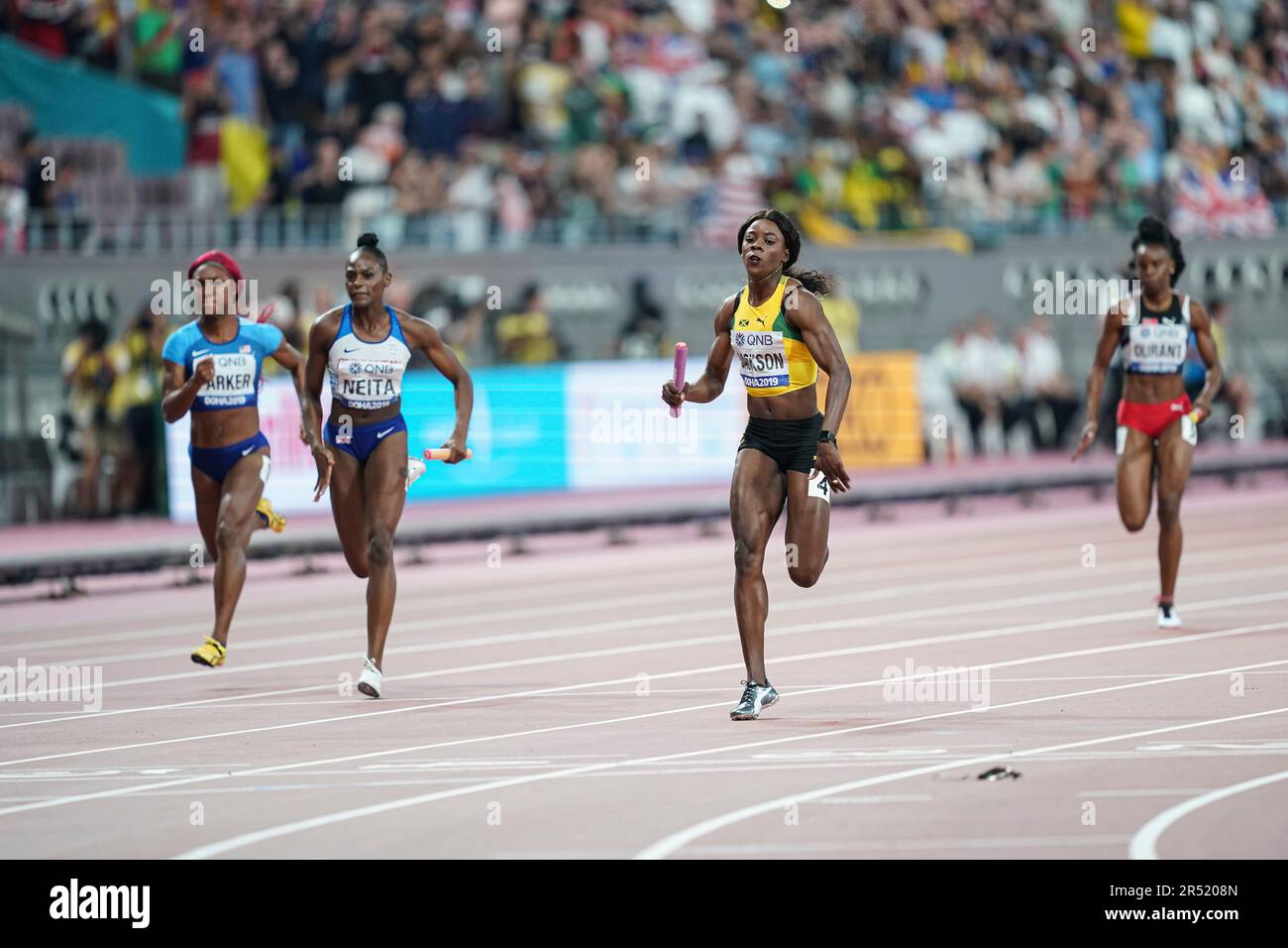 Shericka JACKSON running the 4x100m relay at the 2019 World Athletics ...