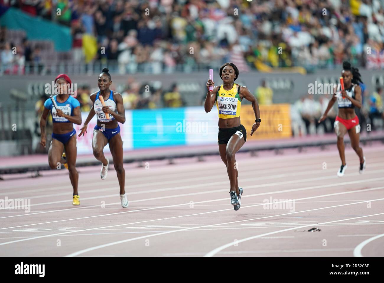 Shericka JACKSON running the 4x100m relay at the 2019 World Athletics ...