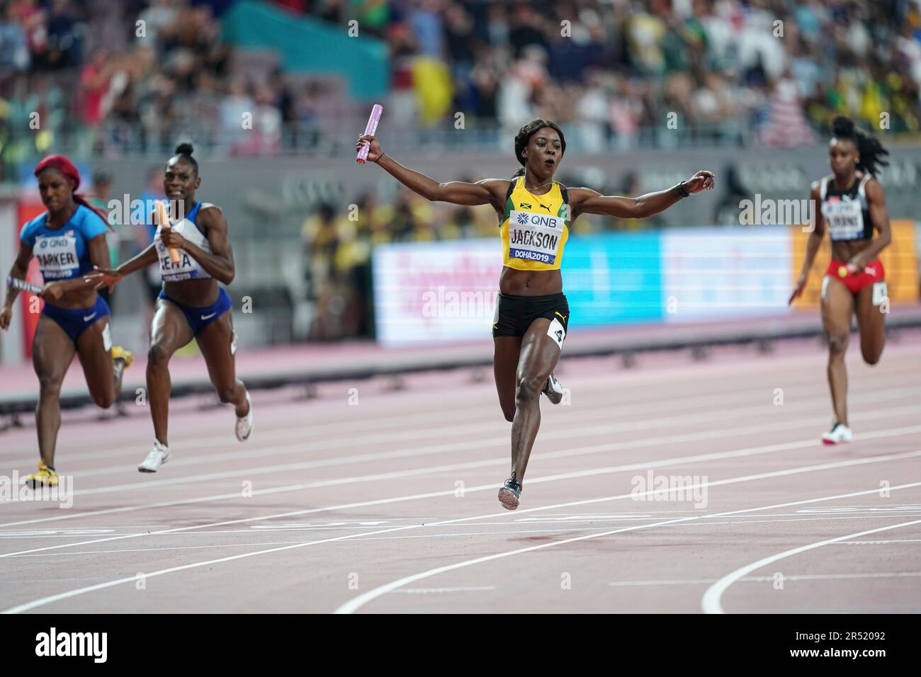 Shericka JACKSON running the 4x100m relay at the 2019 World Athletics ...