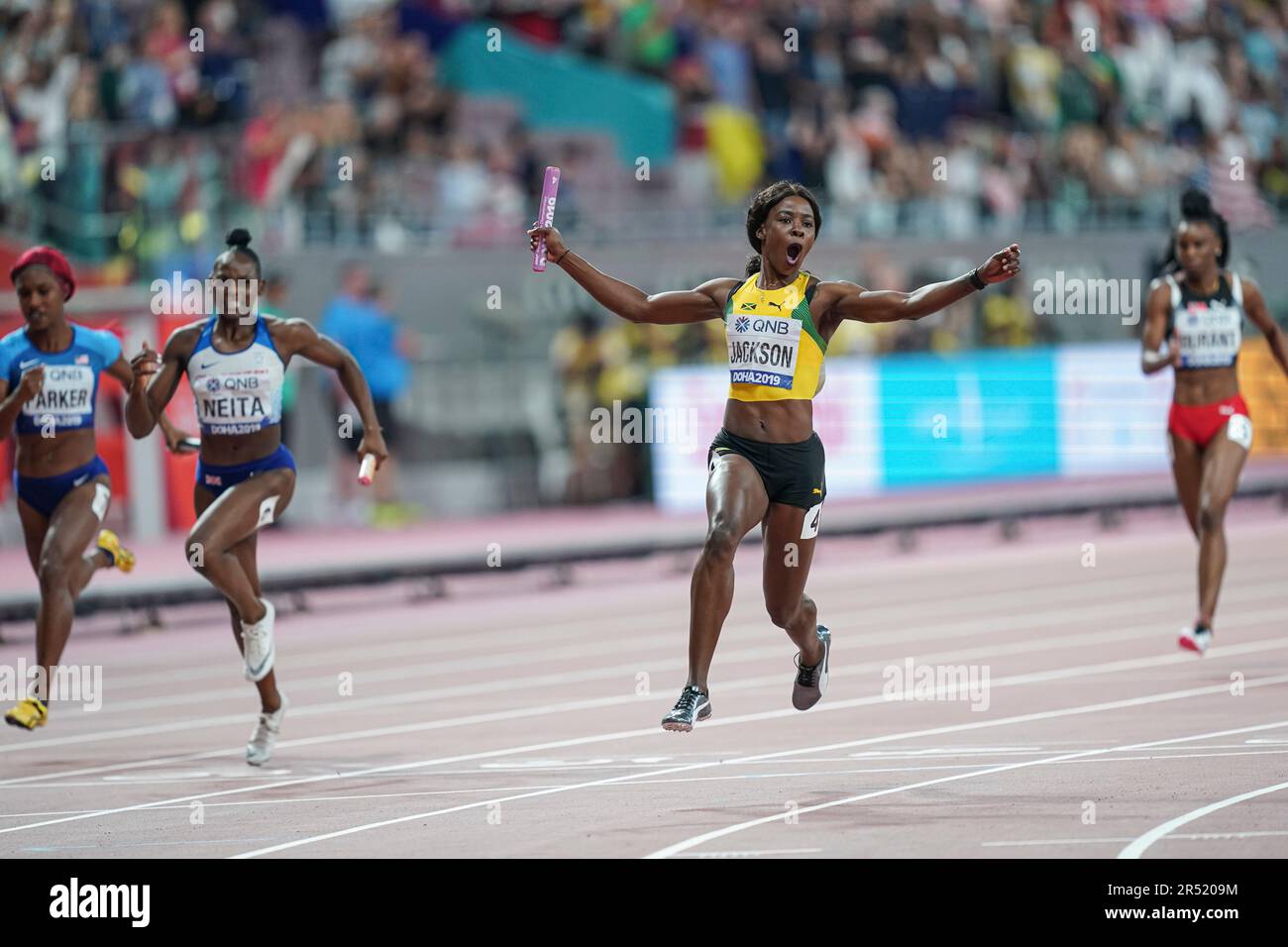 Shericka JACKSON running the 4x100m relay at the 2019 World Athletics ...
