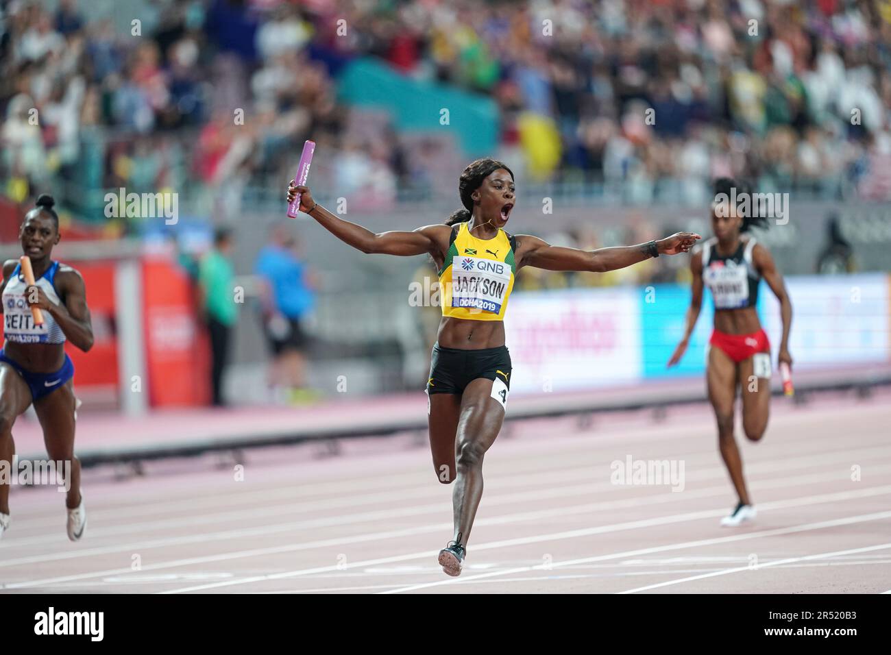 Shericka JACKSON running the 4x100m relay at the 2019 World Athletics ...