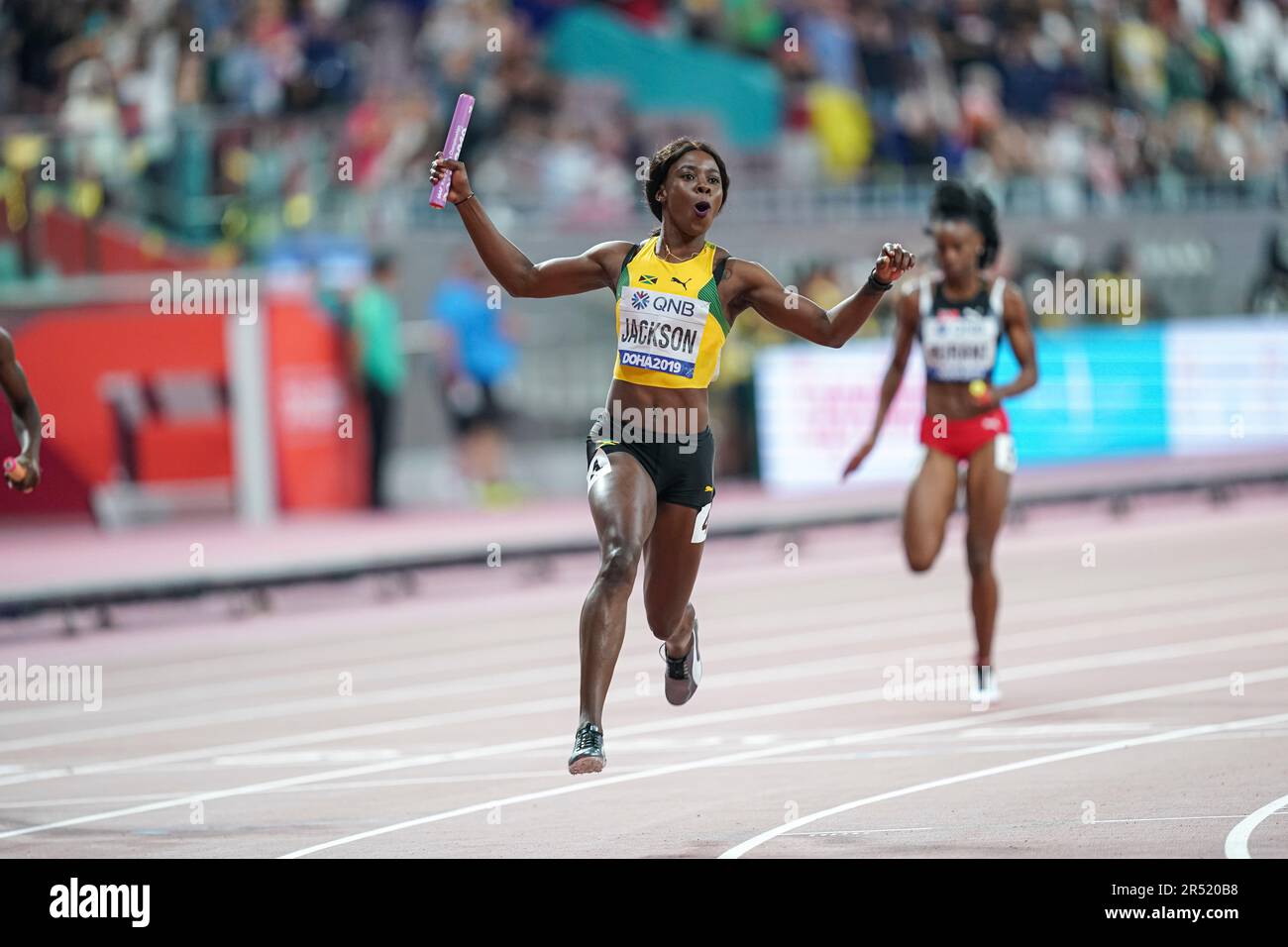 Shericka JACKSON running the 4x100m relay at the 2019 World Athletics ...