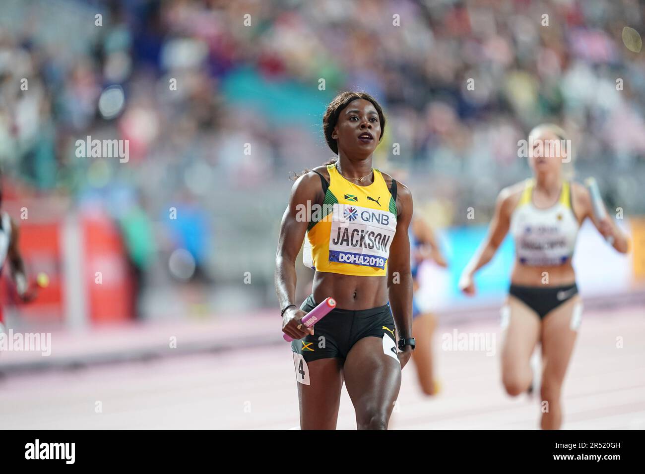 Shericka JACKSON running the 4x100m relay at the 2019 World Athletics ...