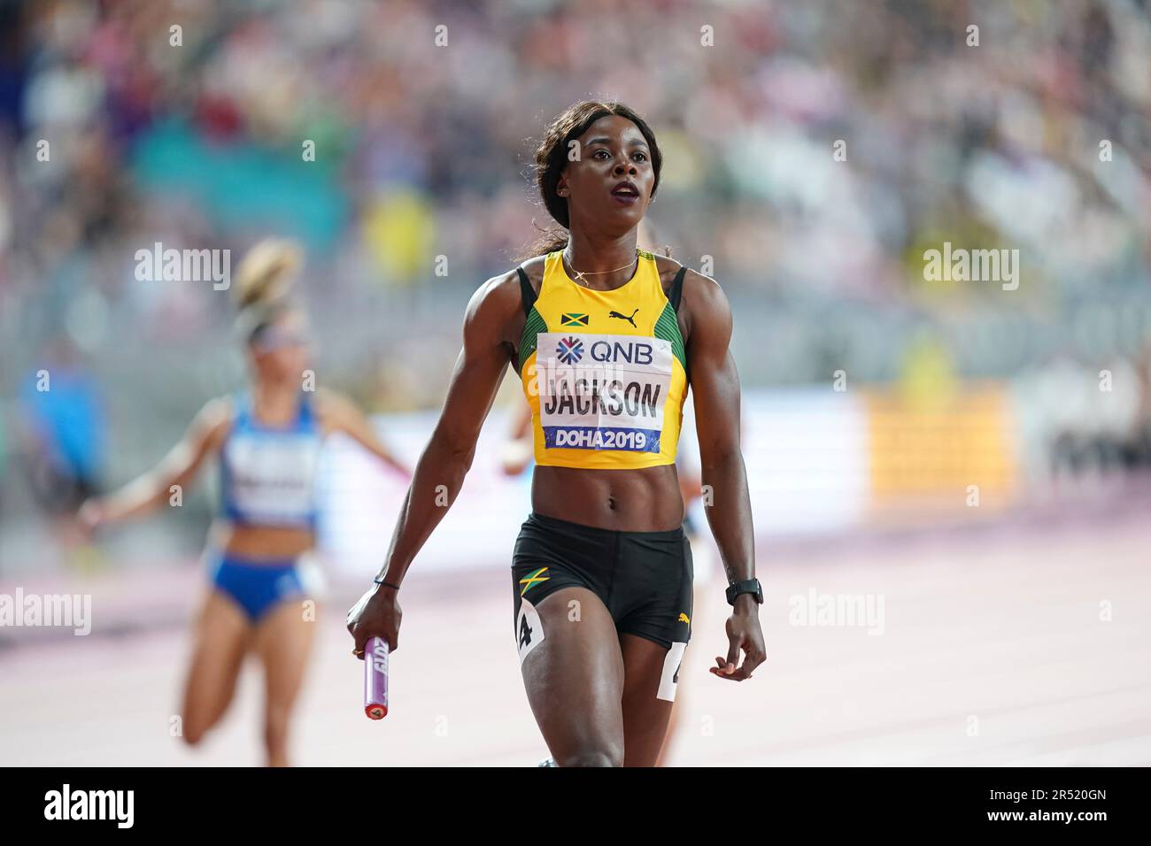 Shericka JACKSON running the 4x100m relay at the 2019 World Athletics ...