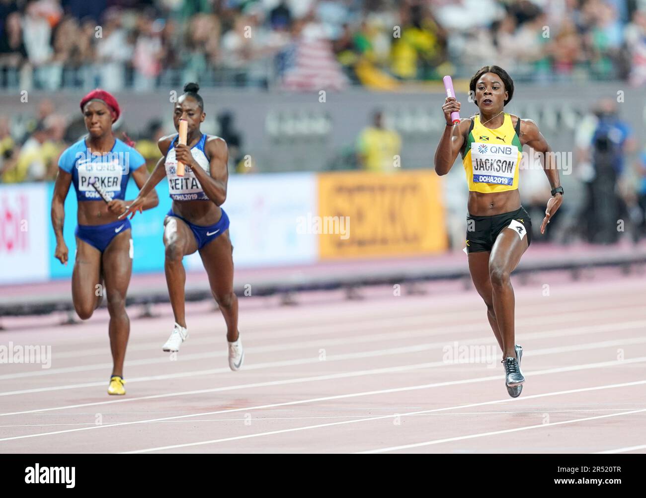 Shericka JACKSON running the 4x100m relay at the 2019 World Athletics ...