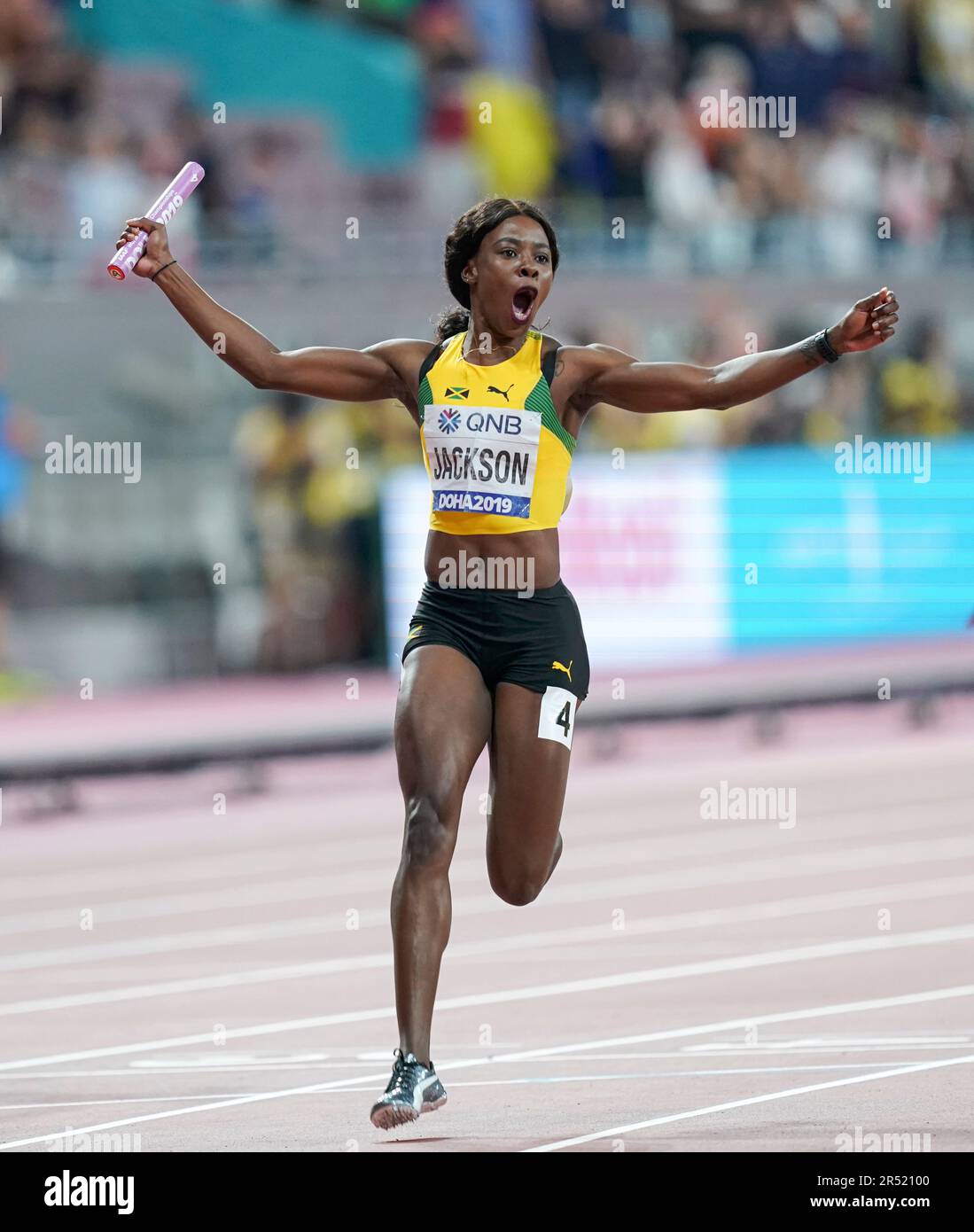 Shericka JACKSON running the 4x100m relay at the 2019 World Athletics ...