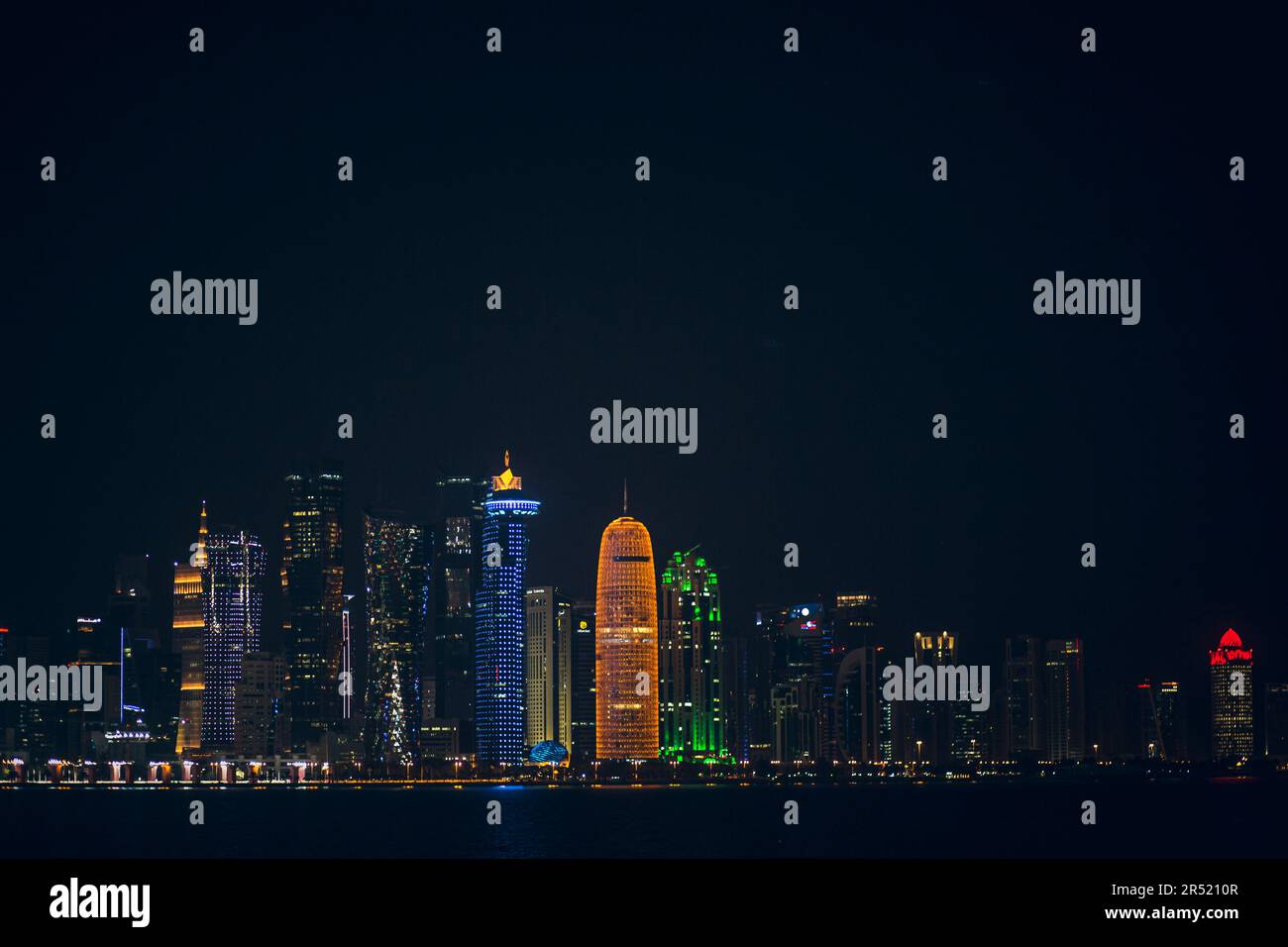 Night image of the Corniche area of the city of Doha (Qatar Stock Photo ...