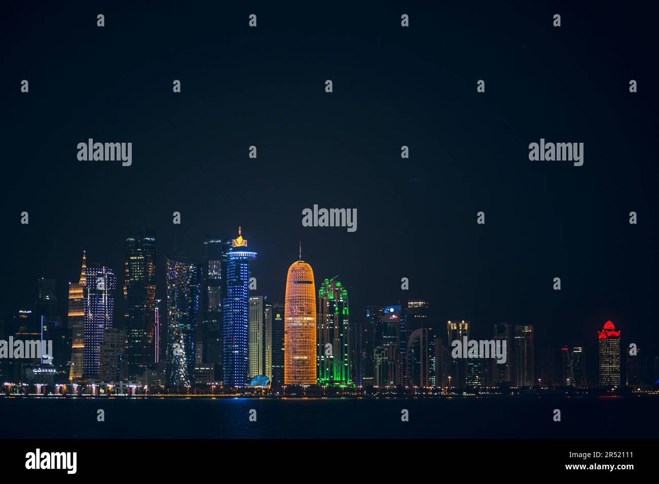 Night image of the Corniche area of the city of Doha (Qatar Stock Photo ...