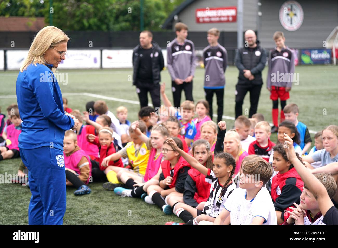 England manager Sarina Wiegman speaks to kids during a youth football ...