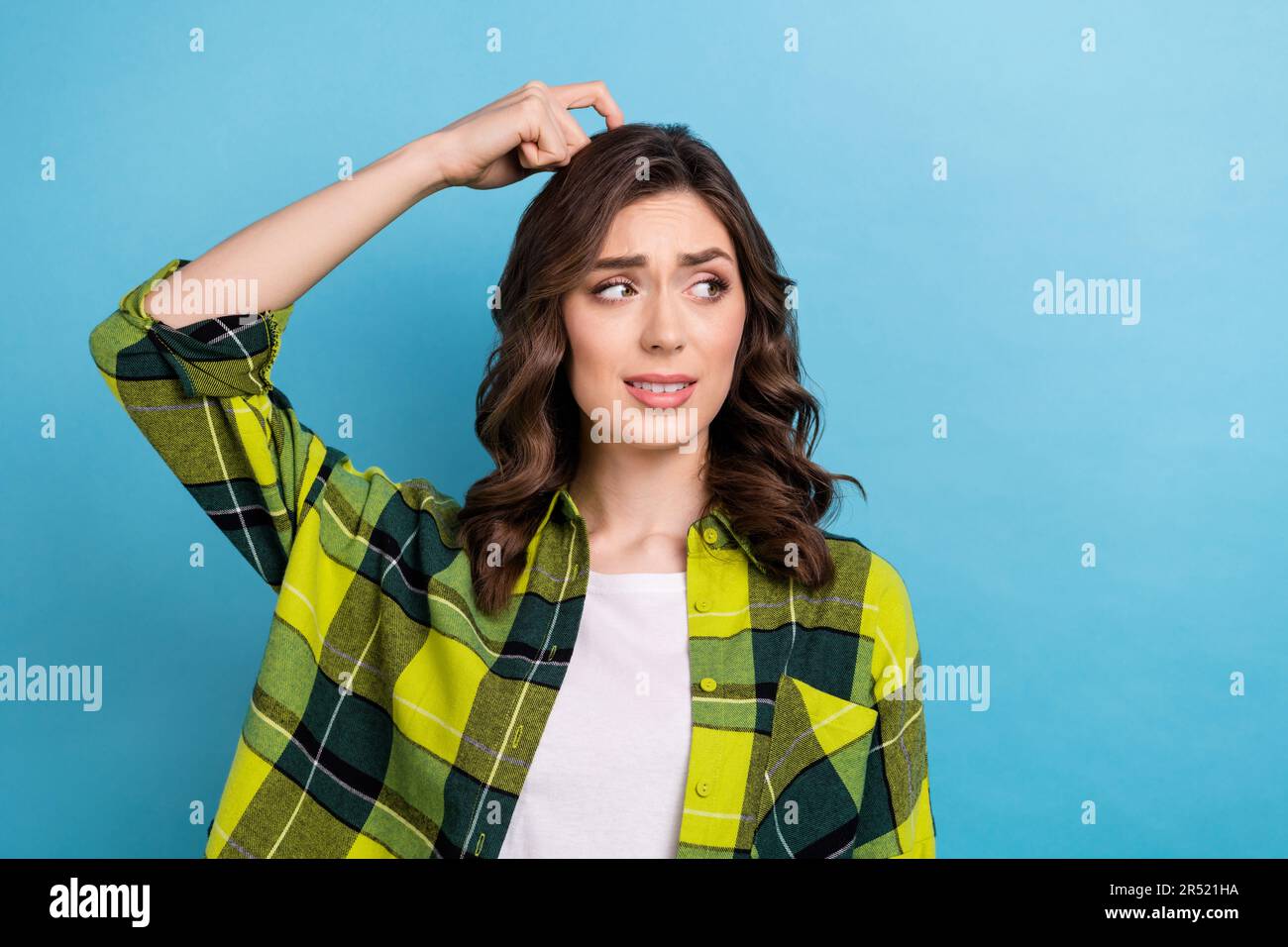 Photo of funky unsure lady wear checkered jacket finger head forget ...