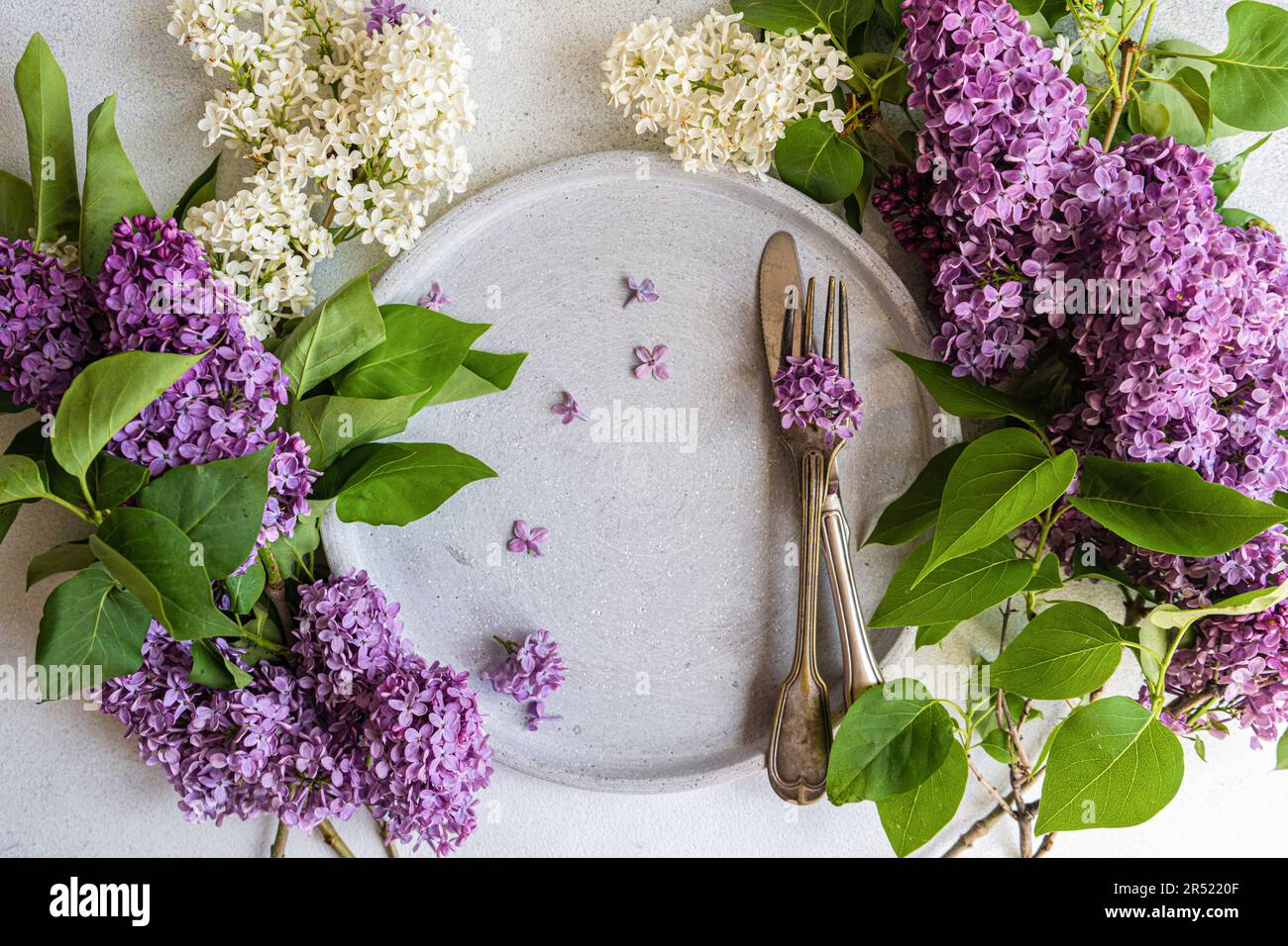 Top view of place setting with vintage ceramic dinnerware with fresh ...