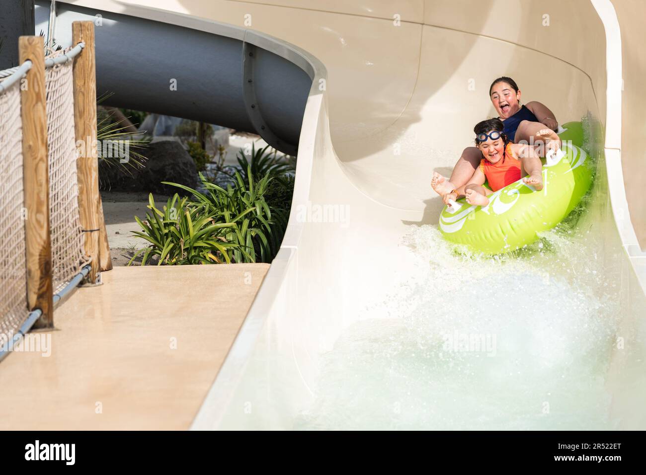 Children water park slide down hi-res stock photography and images - Alamy