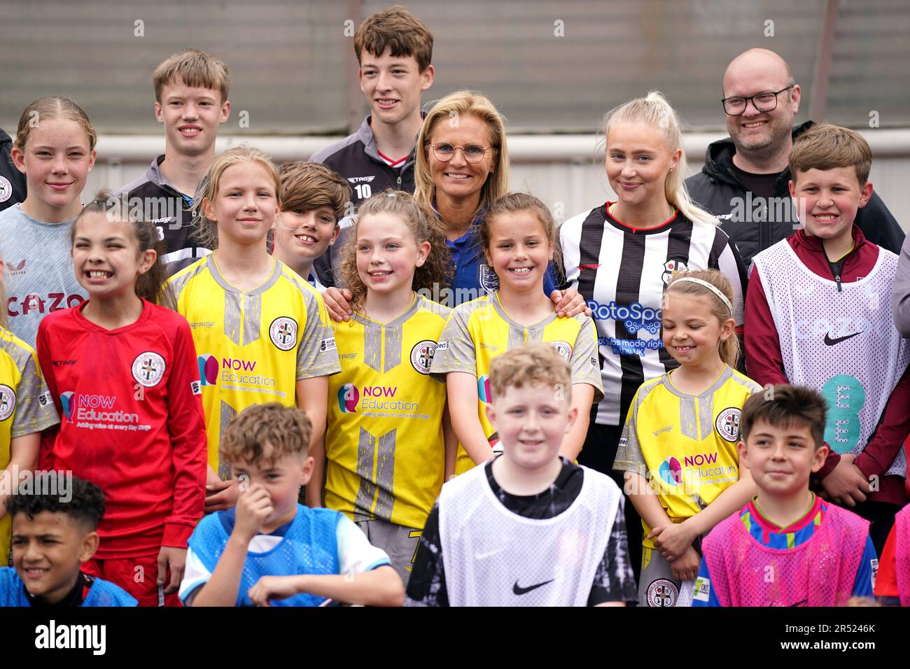 England manager Sarina Wiegman (centre) poses for photographs with kids ...