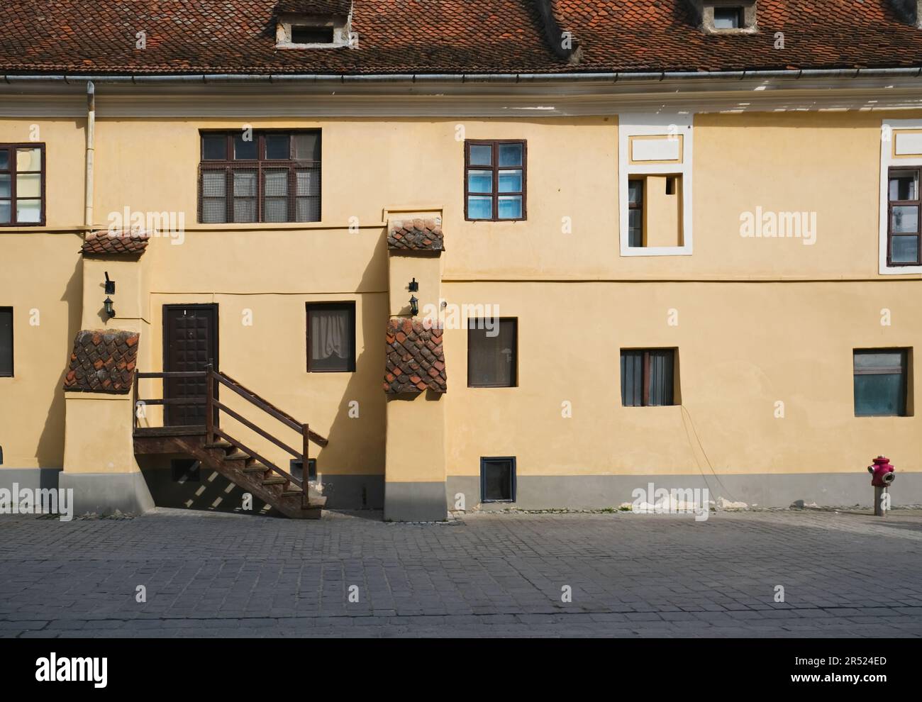 Exterior building architecture in the Old city of Brasov, Transylvania ...