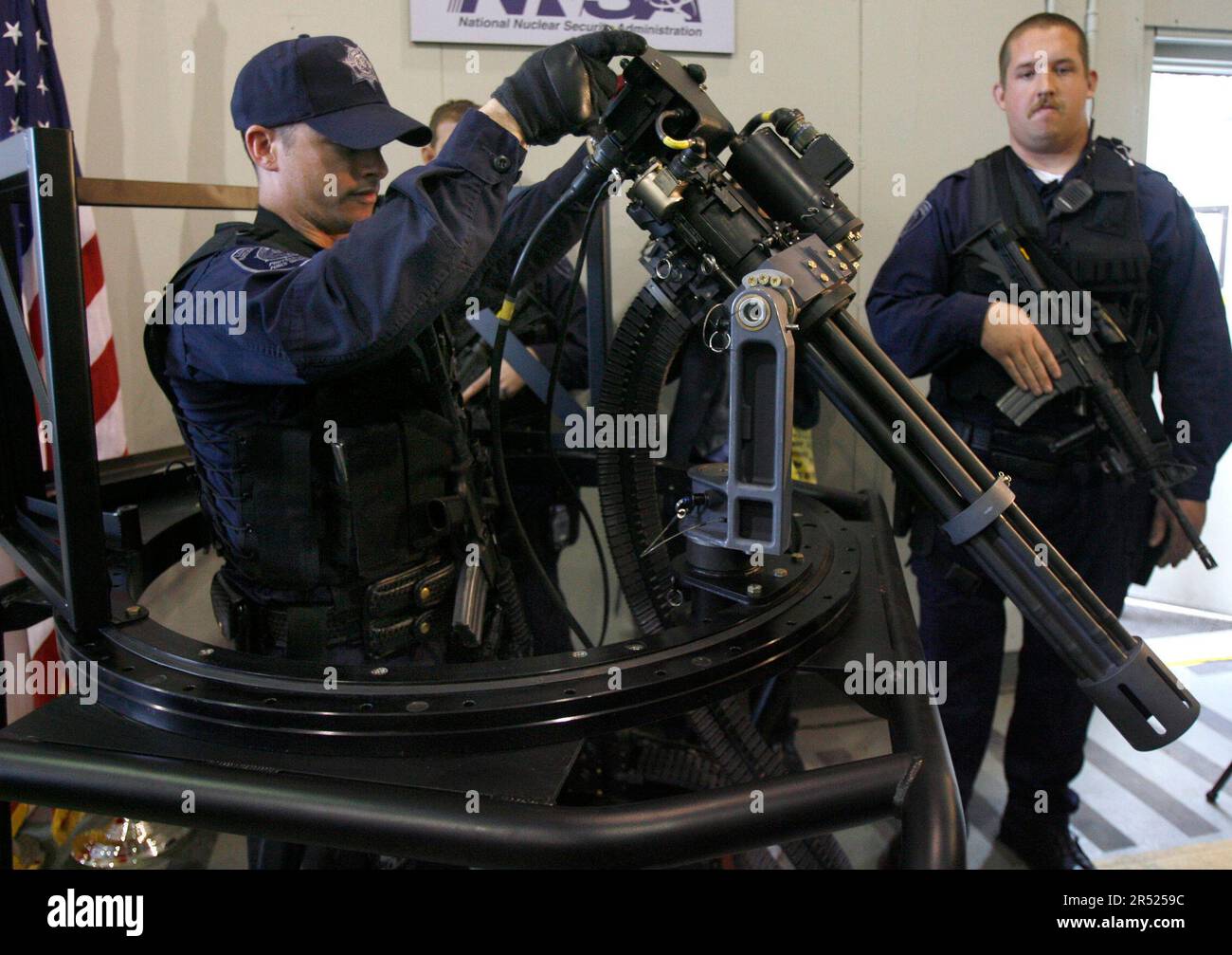 Lawrence Livermore police officer Andrew Graycar demonstrates how the ...