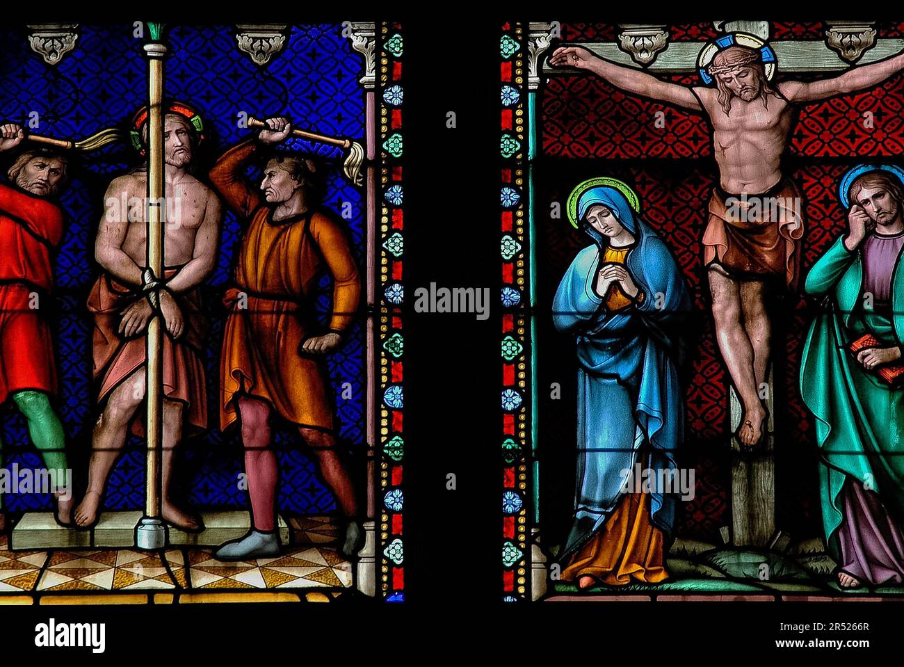 Scourging of Christ and Crucifixion. Depicted in 1800s stained glass in the Chapel of the Holy ...
