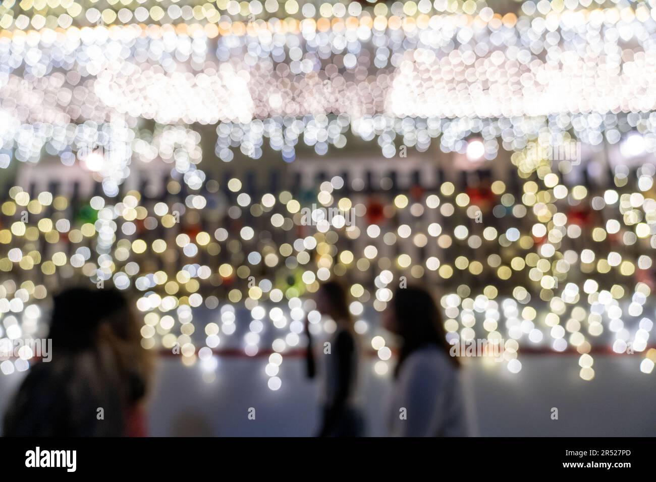 Christmas lights outside at night, intentionally defocused, with blurry ...
